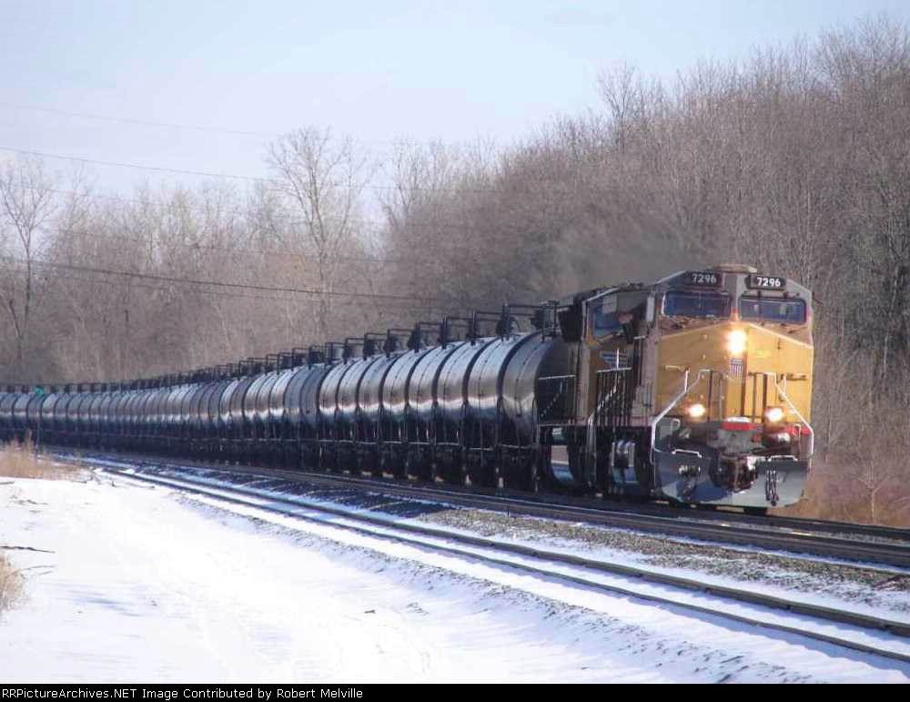 UP 7296 leads a unit ethanol tank train west near MP 381